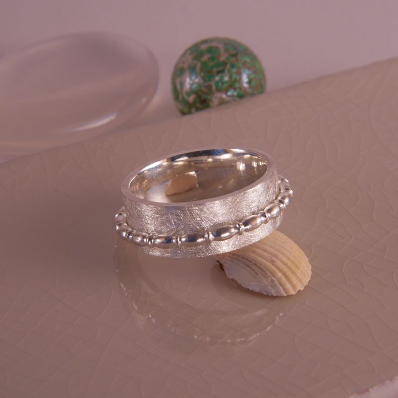 Drehringe und Spinner Ringe aus Silber in verschiedenen Designs jetzt ...